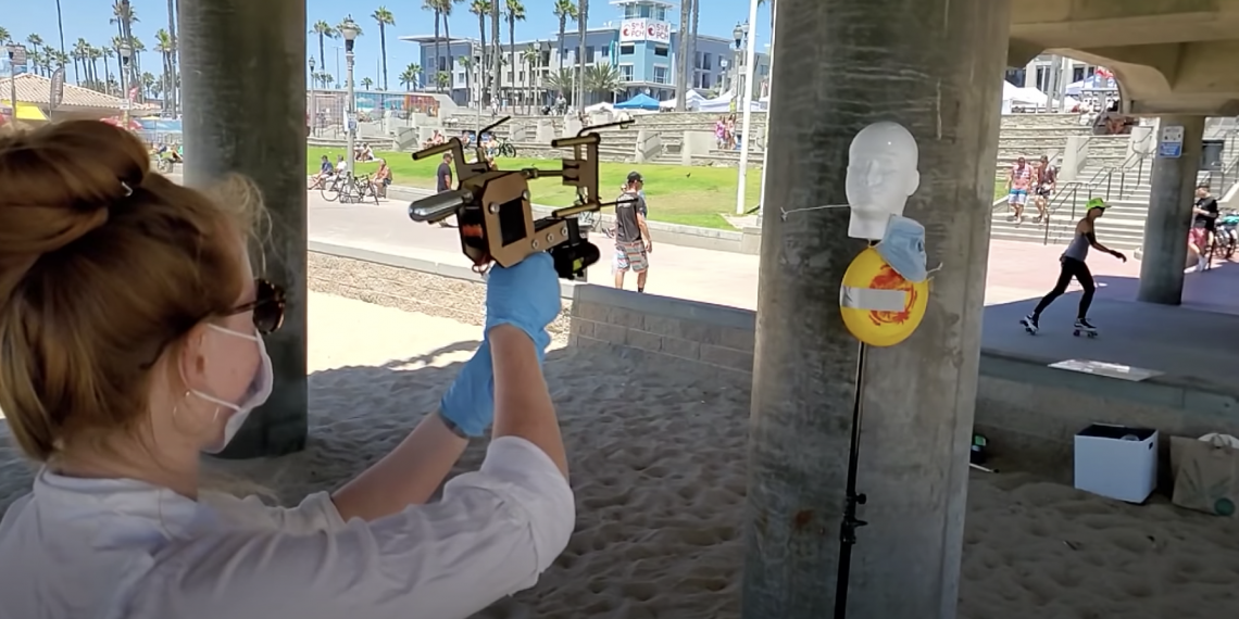 This YouTuber created a 'mask gun' that shoots masks at people's faces ...