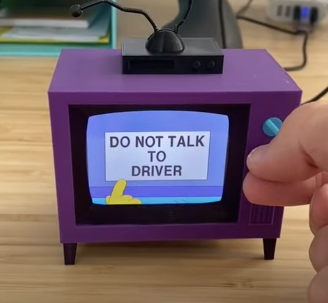 This TV plays Simpsons episodes at random, and it's also really tiny ...