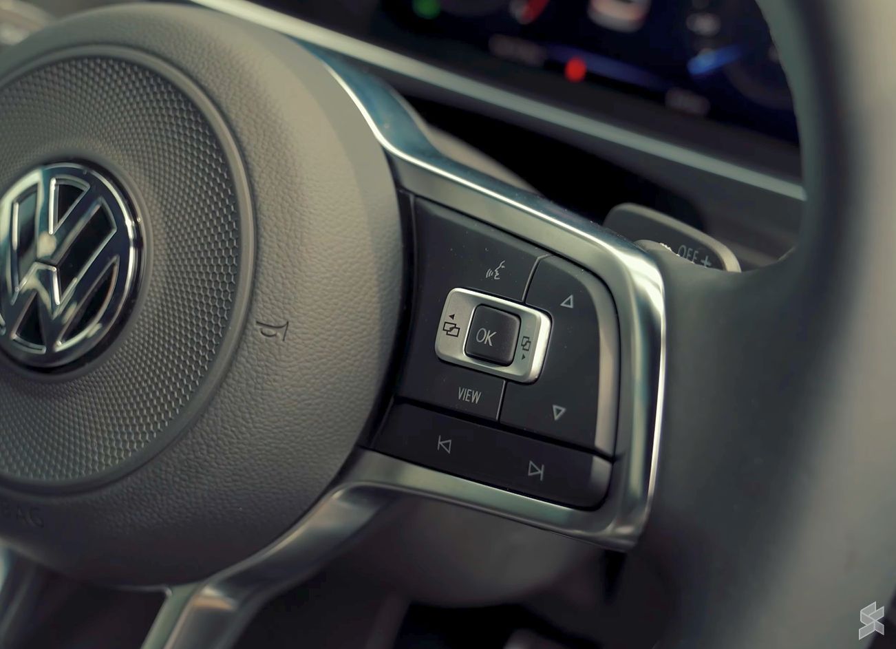 VW is bringing back physical buttons for its steering wheel because ...