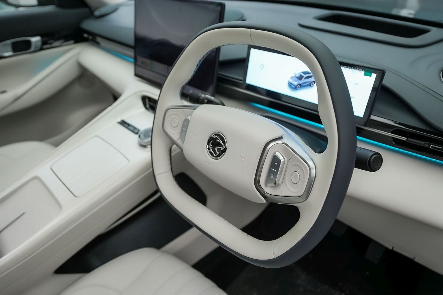 Proton e.MAS 7 in Black exterior and limited White interior